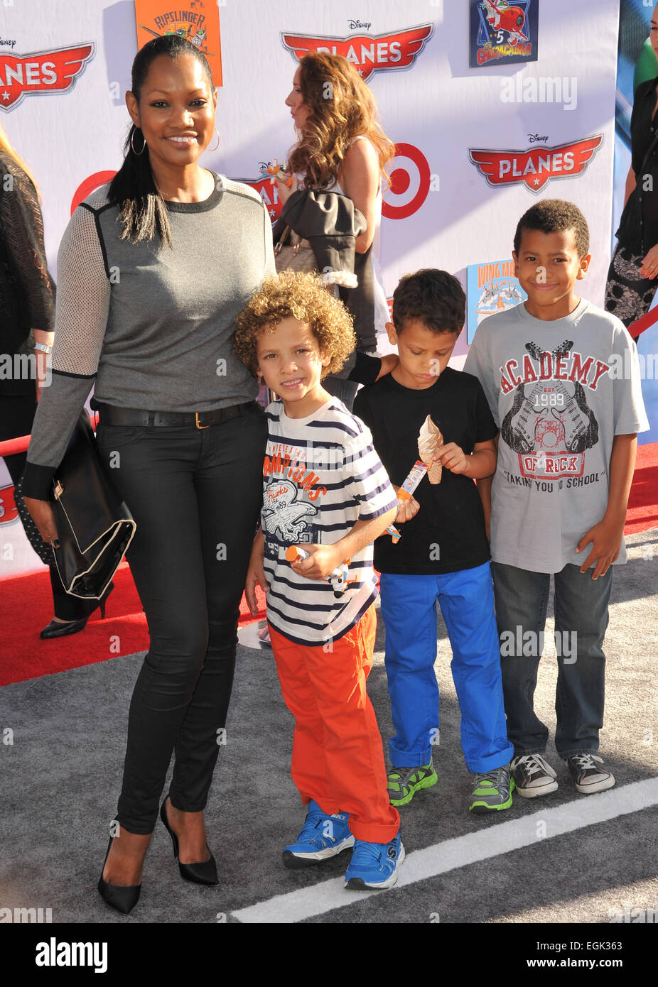 LOS ANGELES, CA - AUGUST 5, 2013: Garcelle Beauvais & sons at the world ...