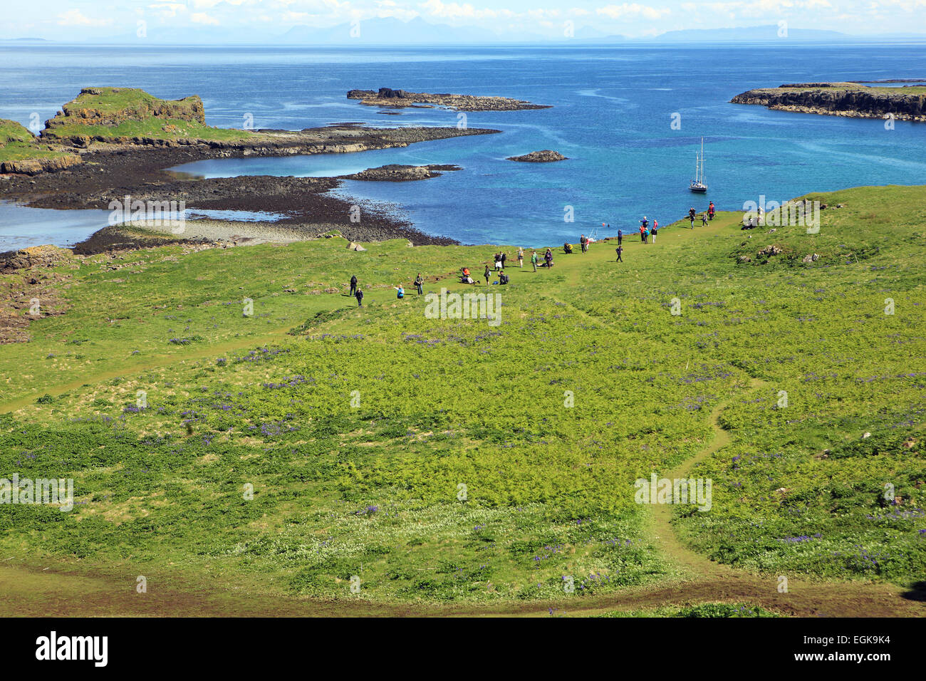 Visitors to Lunga one of the Treshnish Isles in the Inner Hebrides of ...