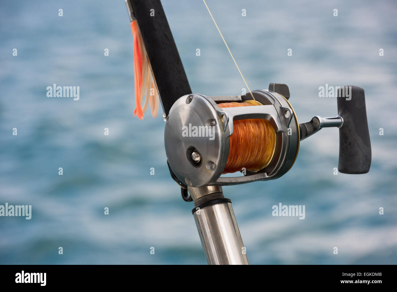 Fishing rod and reel on a boat. Horizontal shot Stock Photo - Alamy