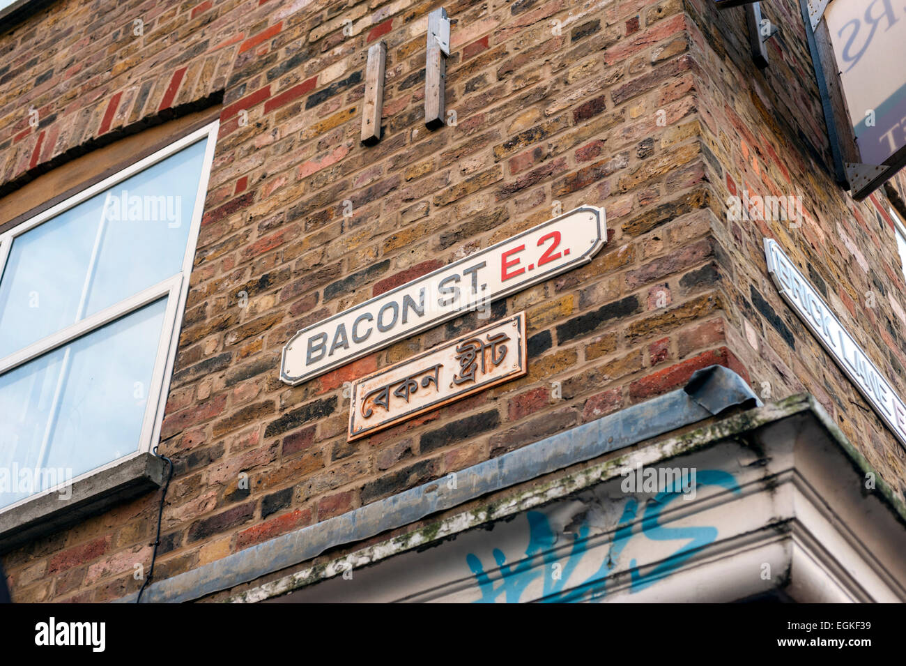Bacon st E2 street sign with name in bangadeshi underneath Stock Photo ...