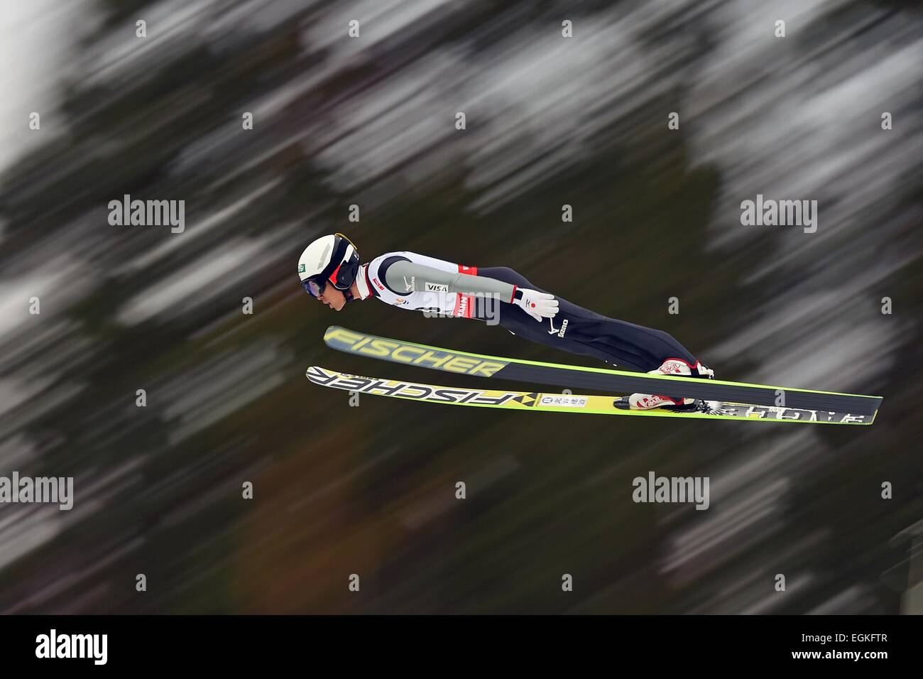 Falun, Sweden. 26th Feb, 2015. Akito Watabe of Japan soars through the ...