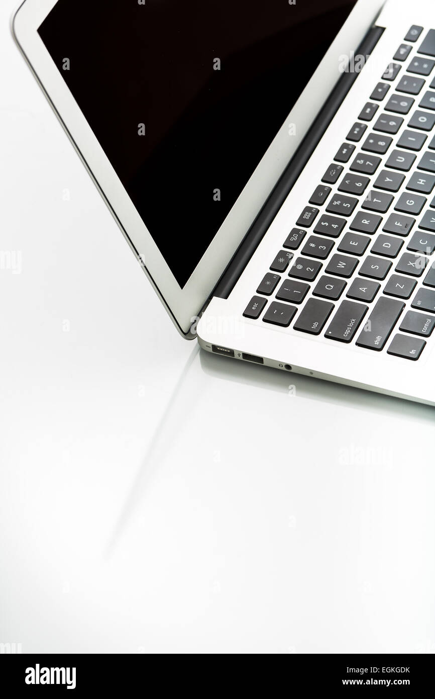 Modern laptop computer on white Stock Photo - Alamy