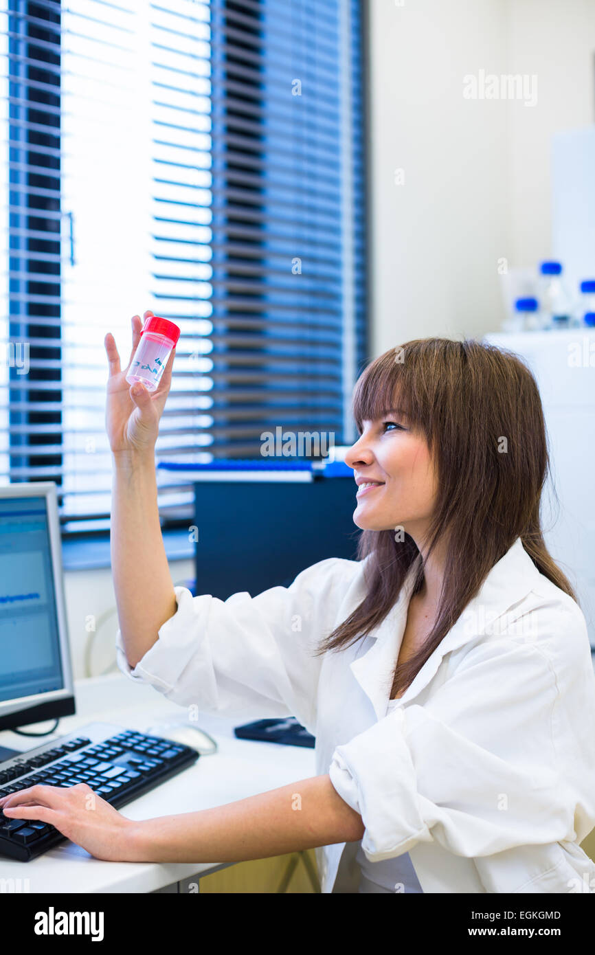 Portrait of a female researcher carrying out research in a chemistry ...