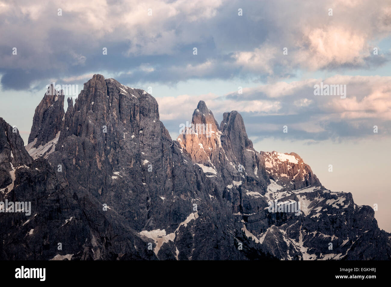 Cloudy sunset at Passo Rolle, Dolomites Alps, Italy Stock Photo - Alamy