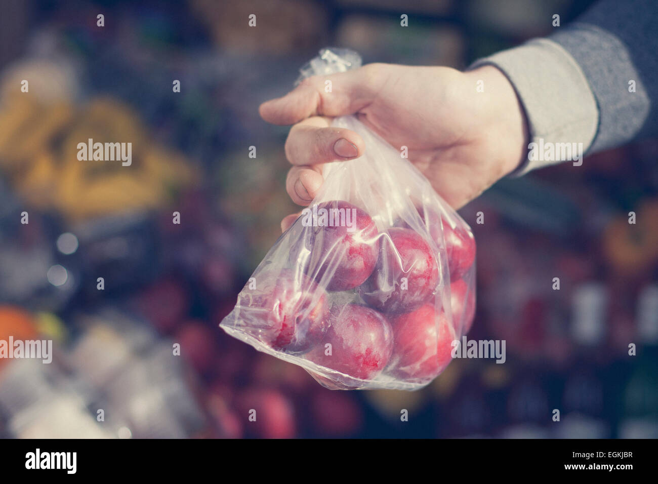 Hands selecting fruit Stock Photo - Alamy
