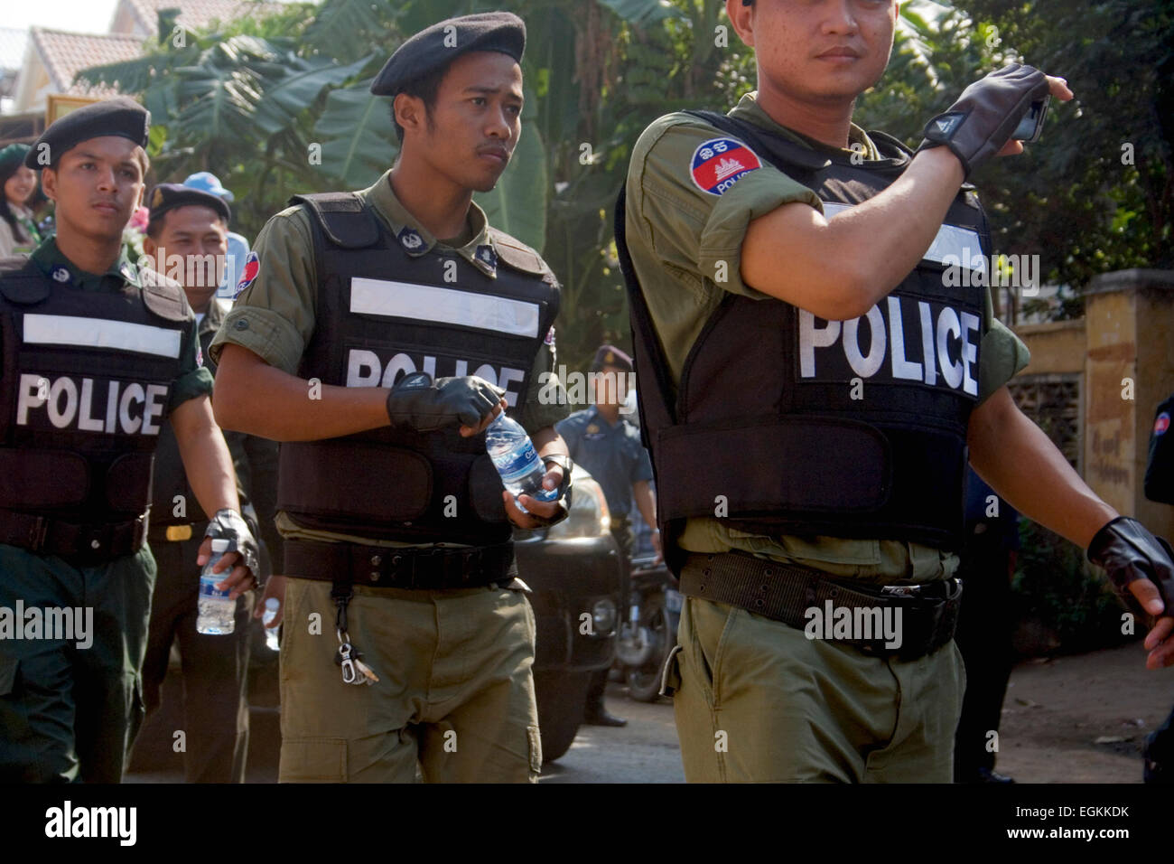 Marching policeman hi-res stock photography and images - Alamy