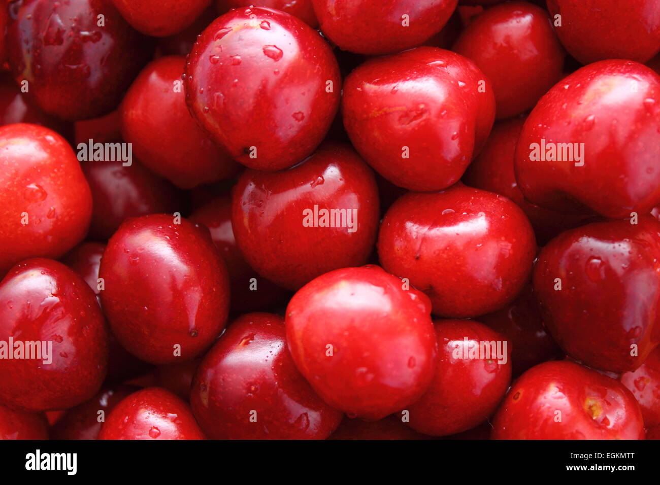 bunch of cherry without the stem attached Stock Photo - Alamy