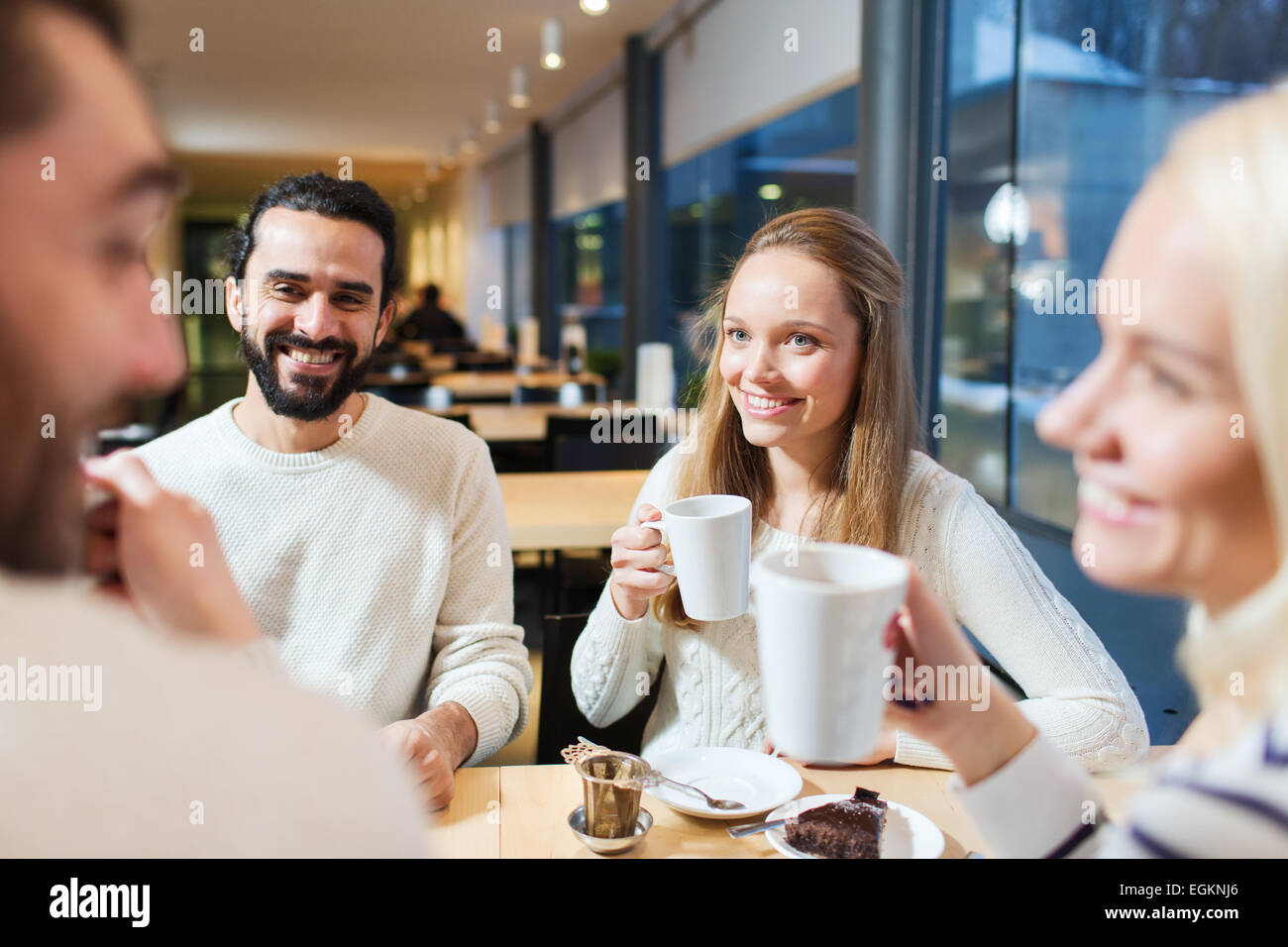 happy friends meeting and drinking tea or coffee Stock Photo - Alamy