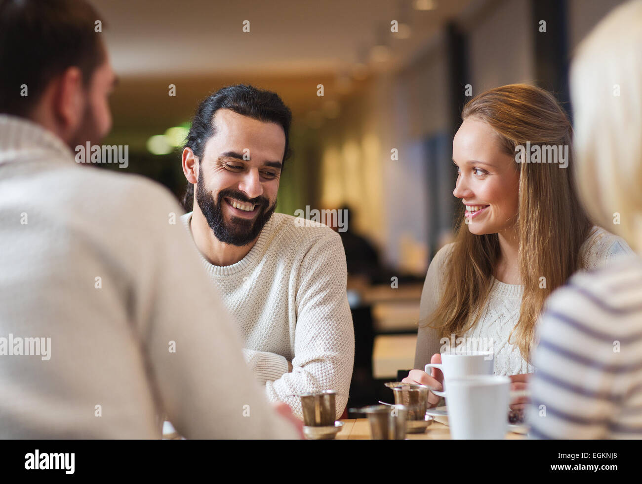 happy friends meeting and drinking tea or coffee Stock Photo - Alamy