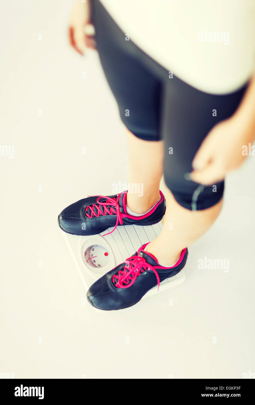 woman legs standing on scales Stock Photo - Alamy