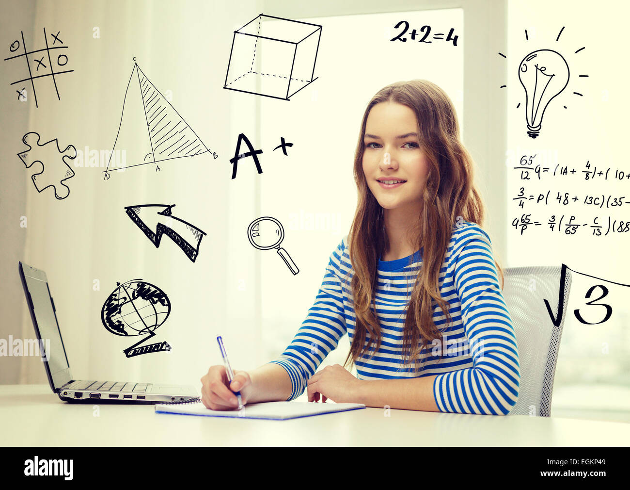 smiling teenage girl laptop computer and notebook Stock Photo - Alamy