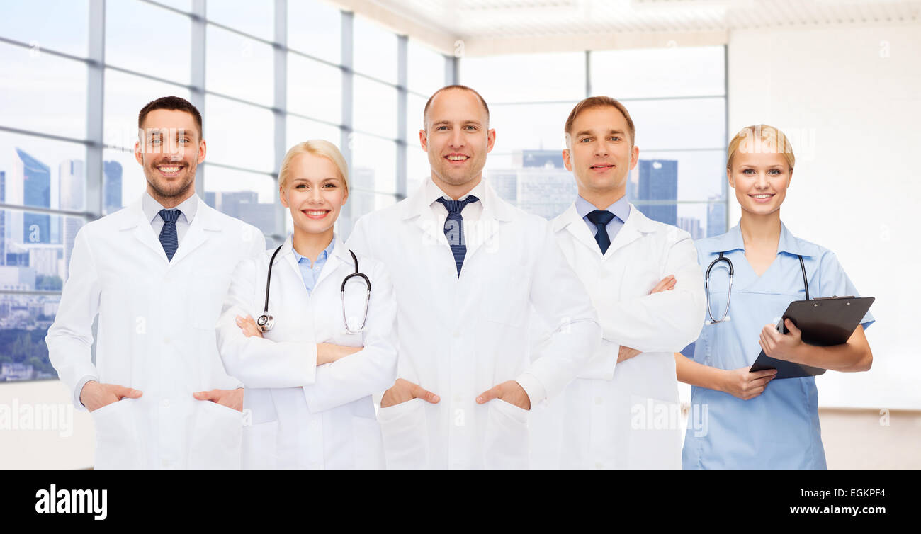 group of smiling doctors with clipboard Stock Photo - Alamy