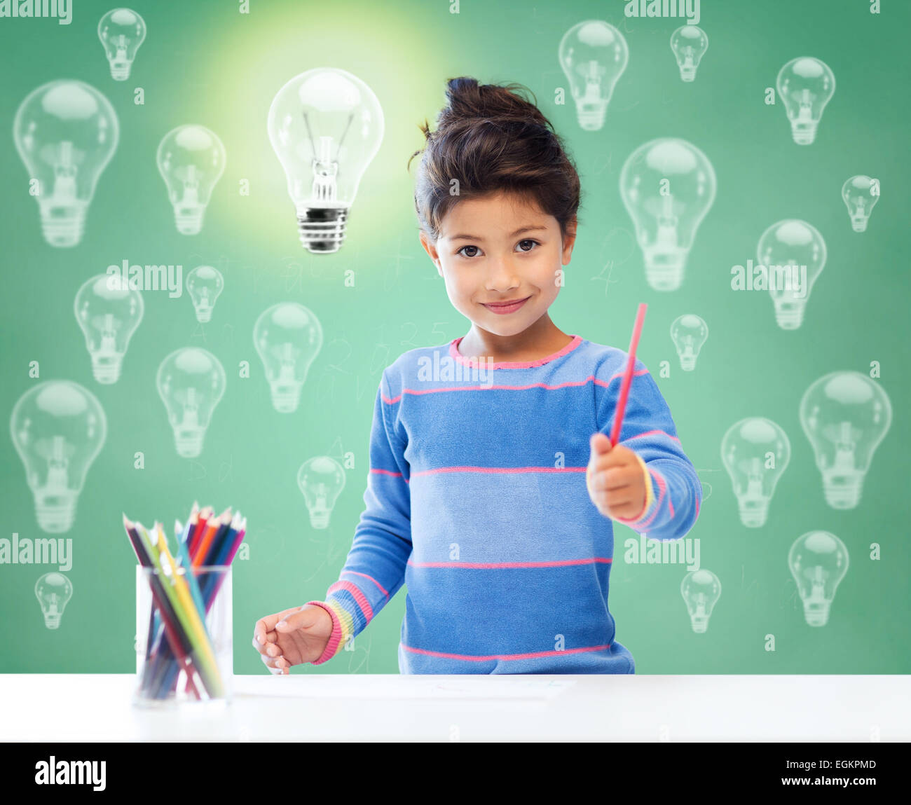 happy school girl drawing with coloring pencils Stock Photo - Alamy