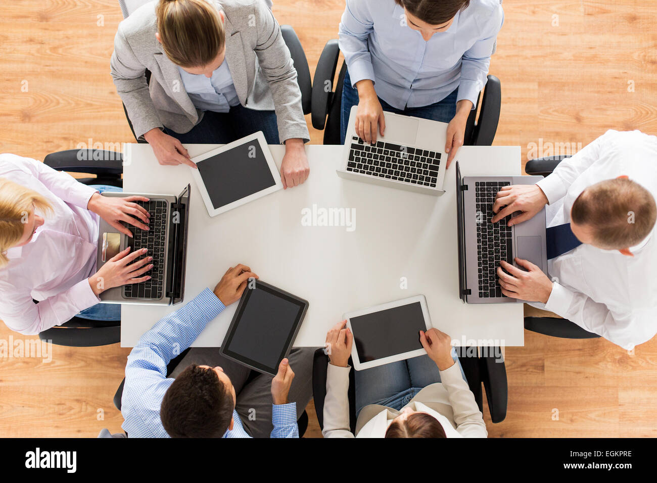 Laptop people team tablet hi-res stock photography and images - Alamy