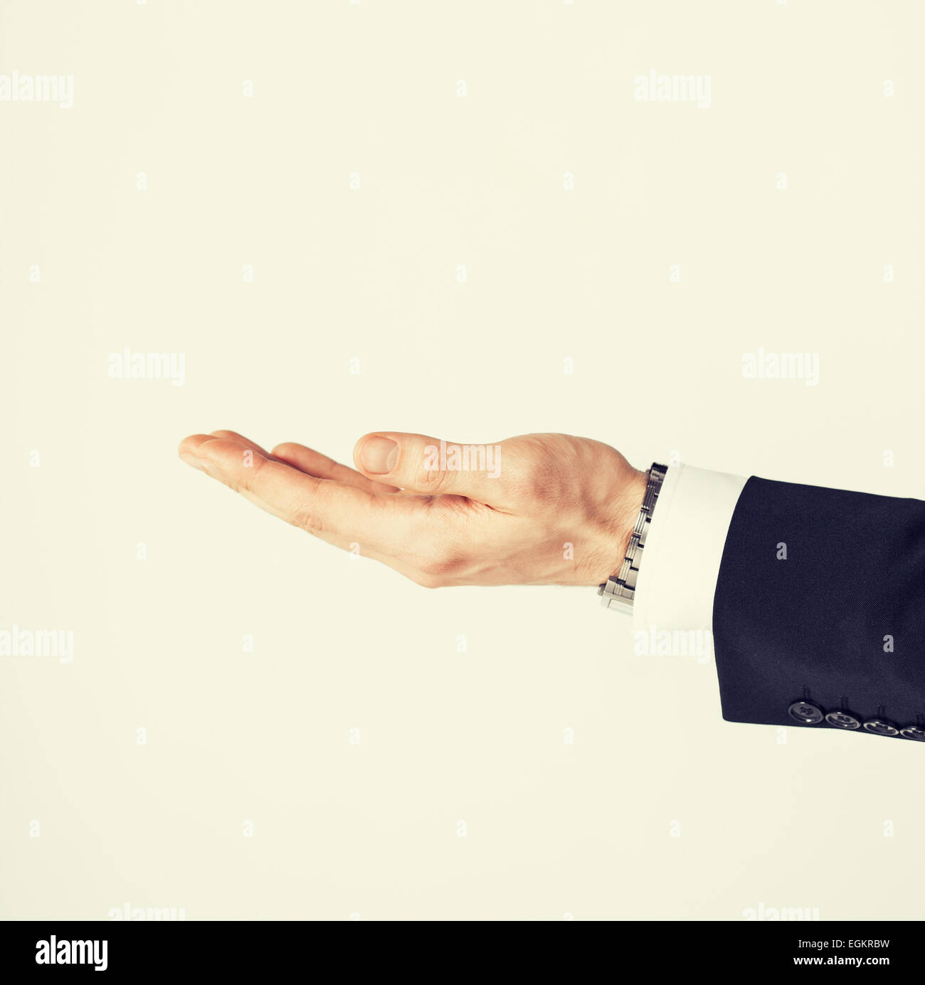 Mans hand holding something hi-res stock photography and images - Alamy