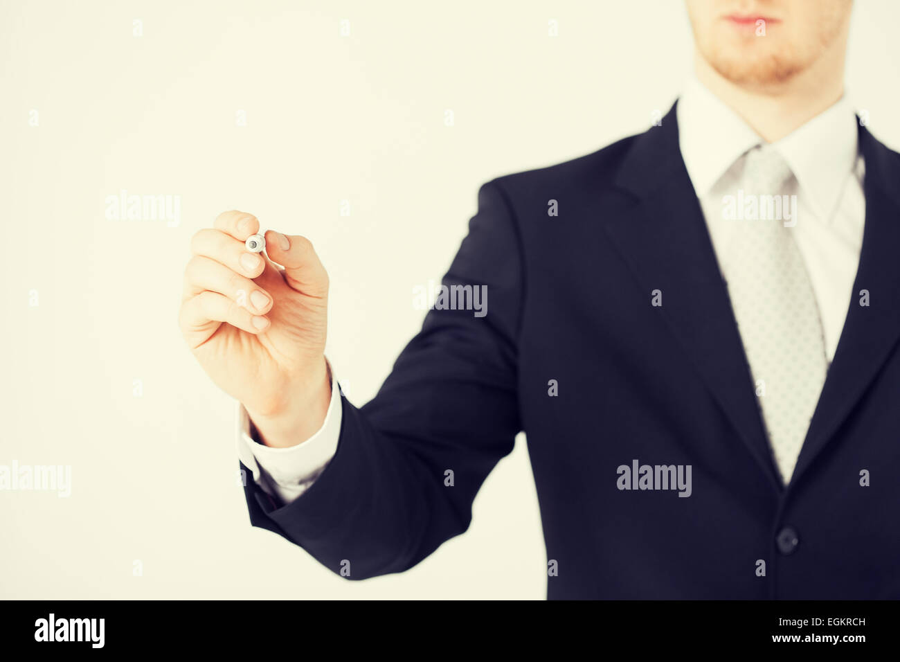 man writing something in the air Stock Photo - Alamy