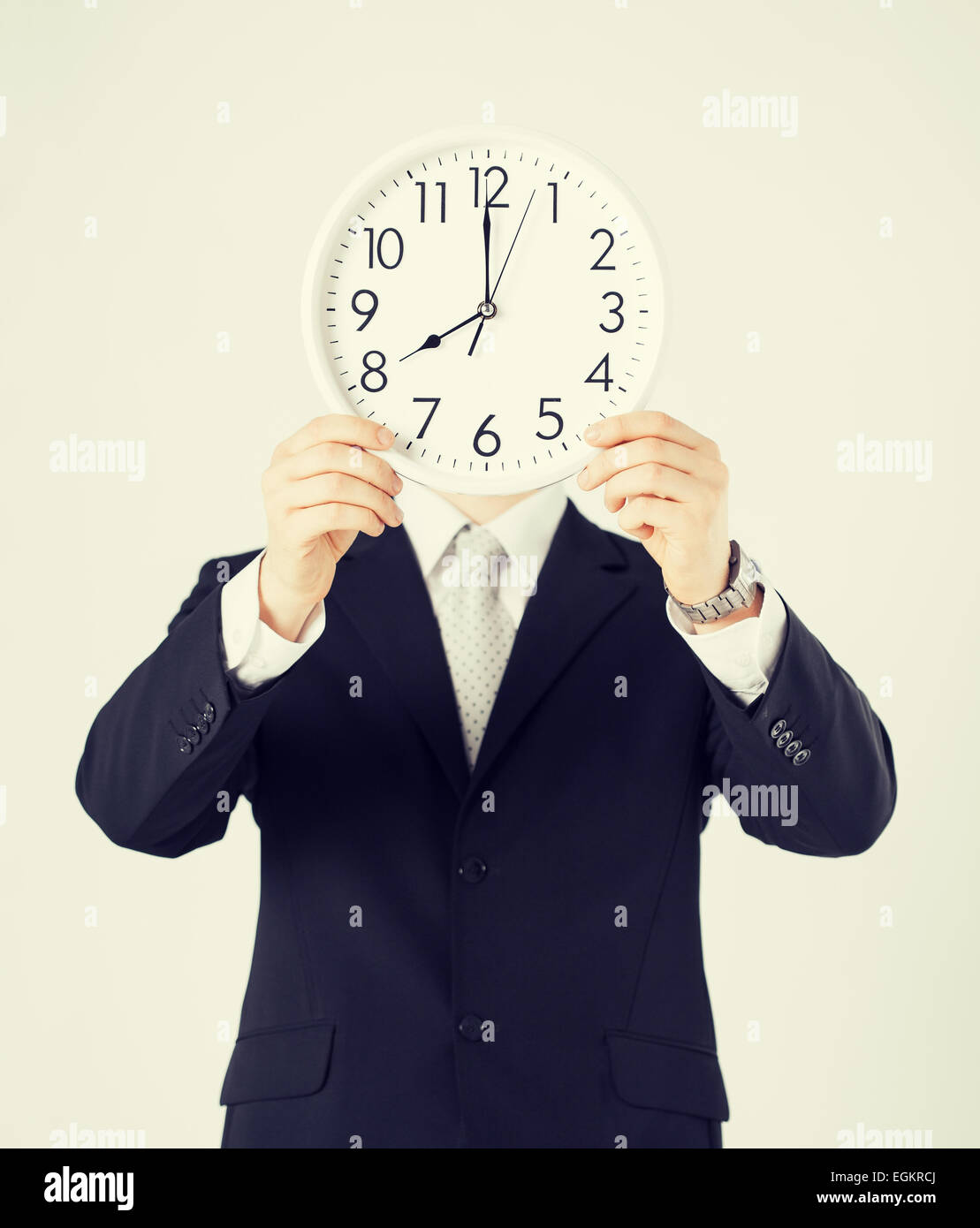 man with wall clock Stock Photo - Alamy