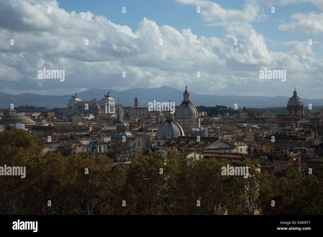 View across the roof tops of Rome towards the mountains Stock Photo - Alamy