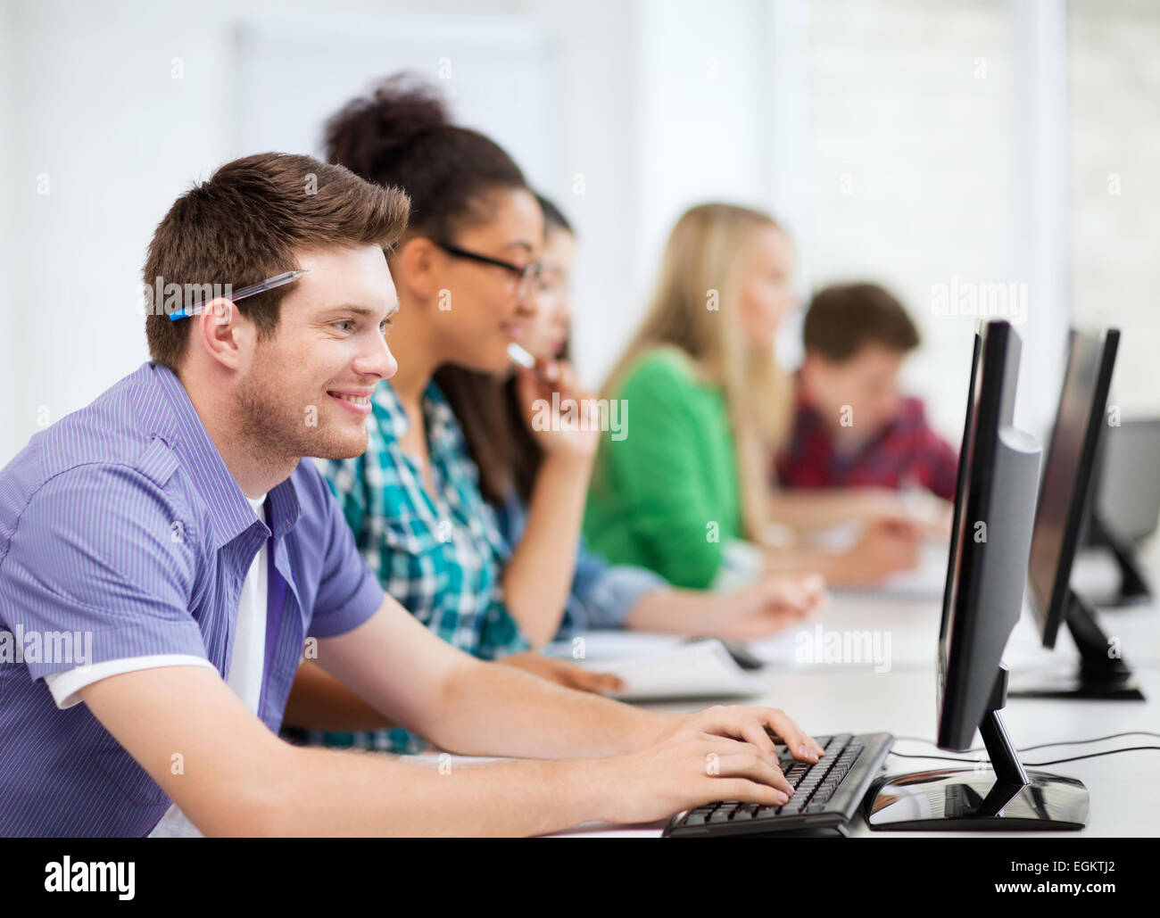 students with computers studying at school Stock Photo - Alamy