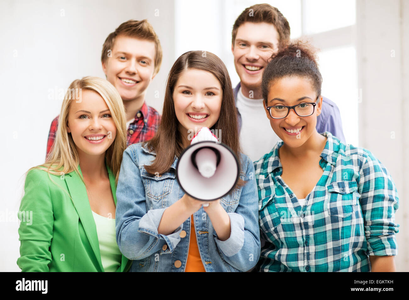group of students with megaphone at school Stock Photo - Alamy