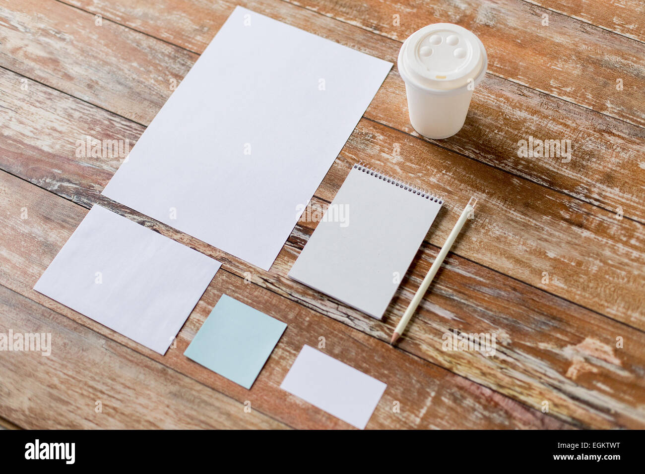 close up of notebook, coffee cup and papers Stock Photo - Alamy