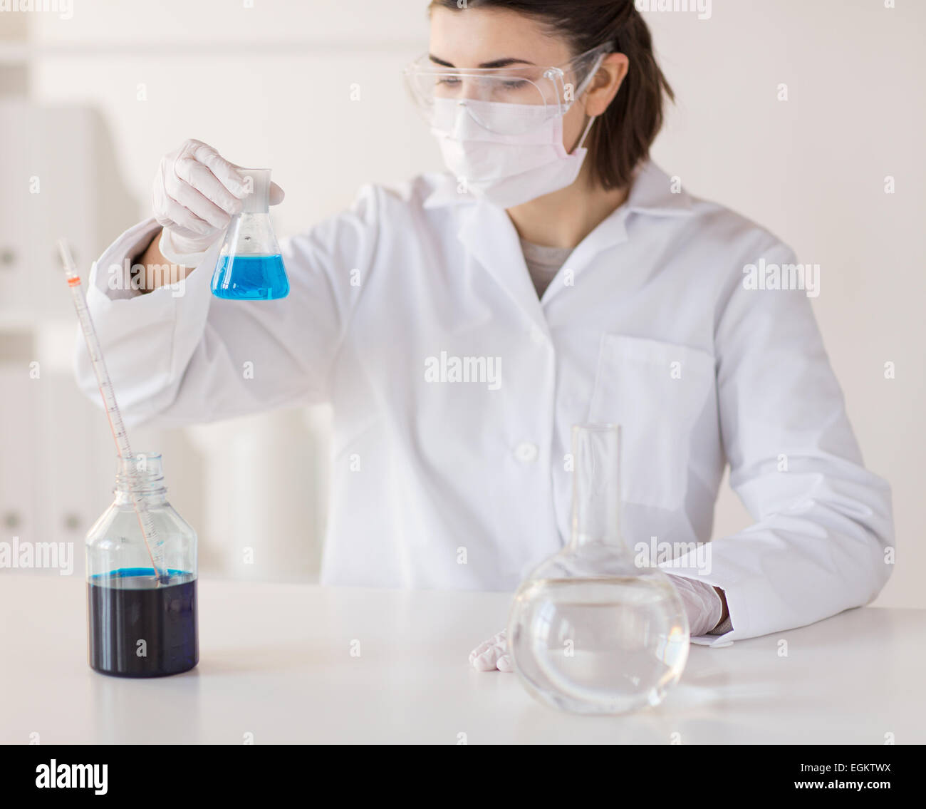 Scientist holding with jar hi-res stock photography and images - Alamy