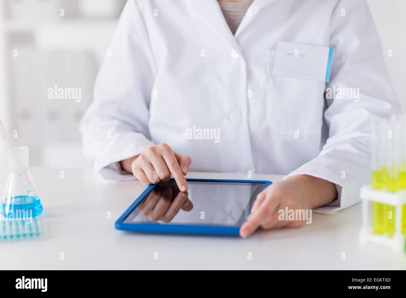 close up of scientist with tablet pc in lab Stock Photo - Alamy