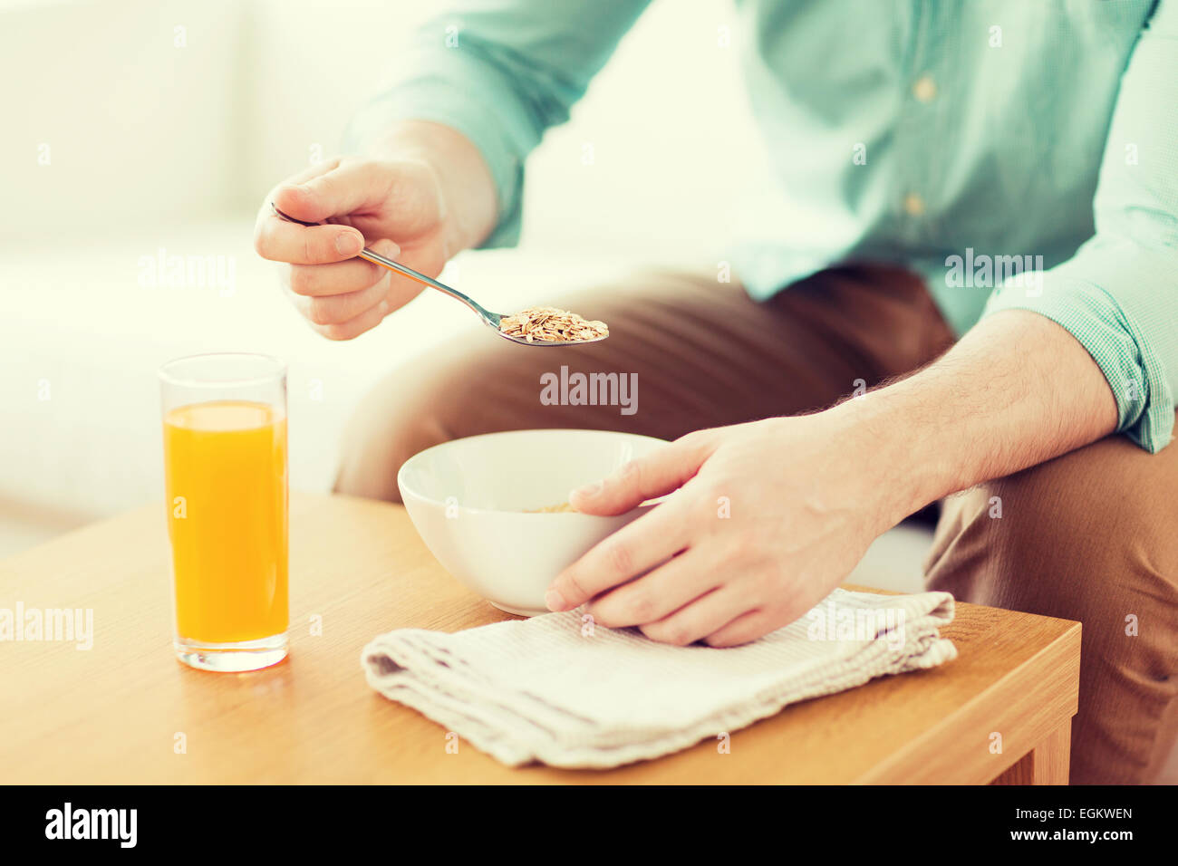 Man eating breakfast hi-res stock photography and images - Alamy