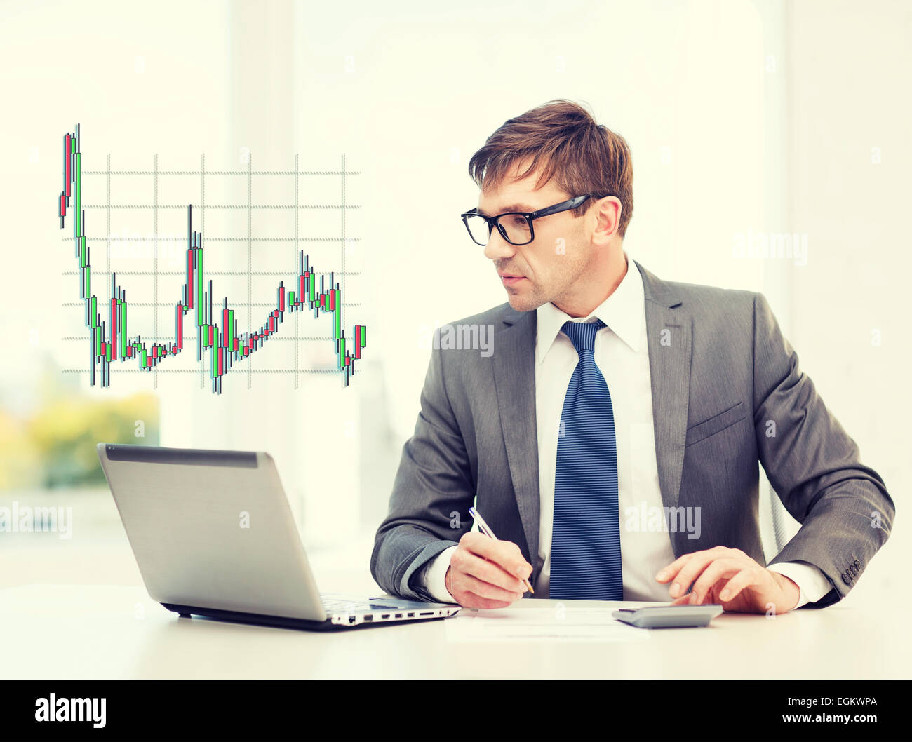 businessman with computer, papers and calculator Stock Photo - Alamy