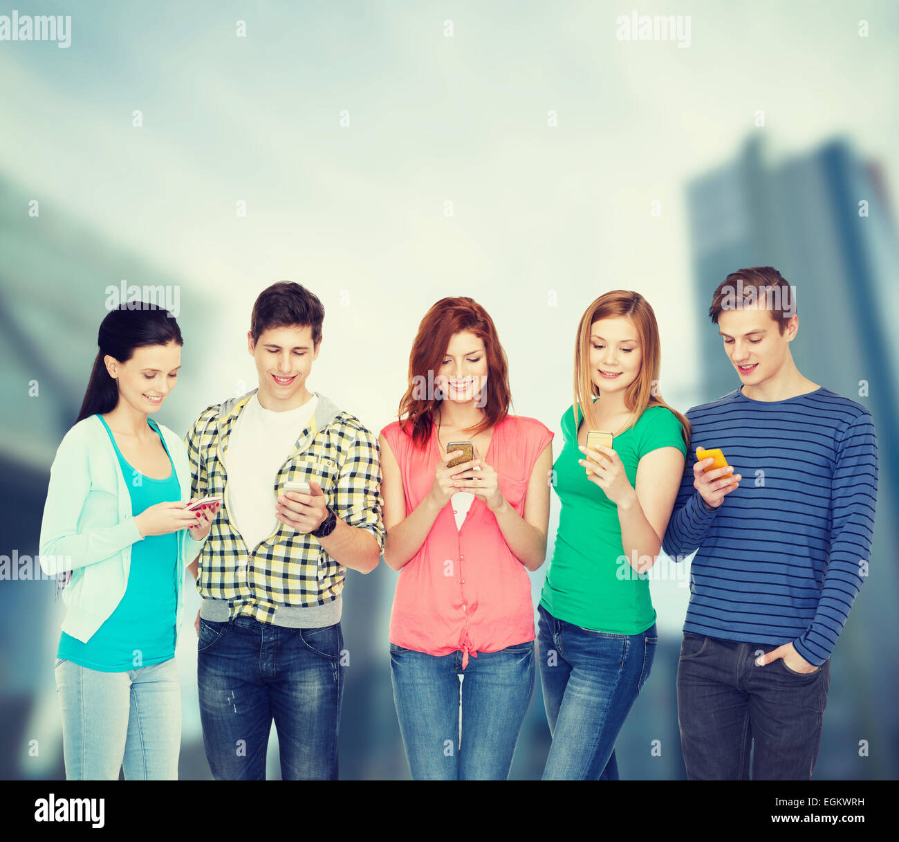 smiling students with smartphones Stock Photo - Alamy