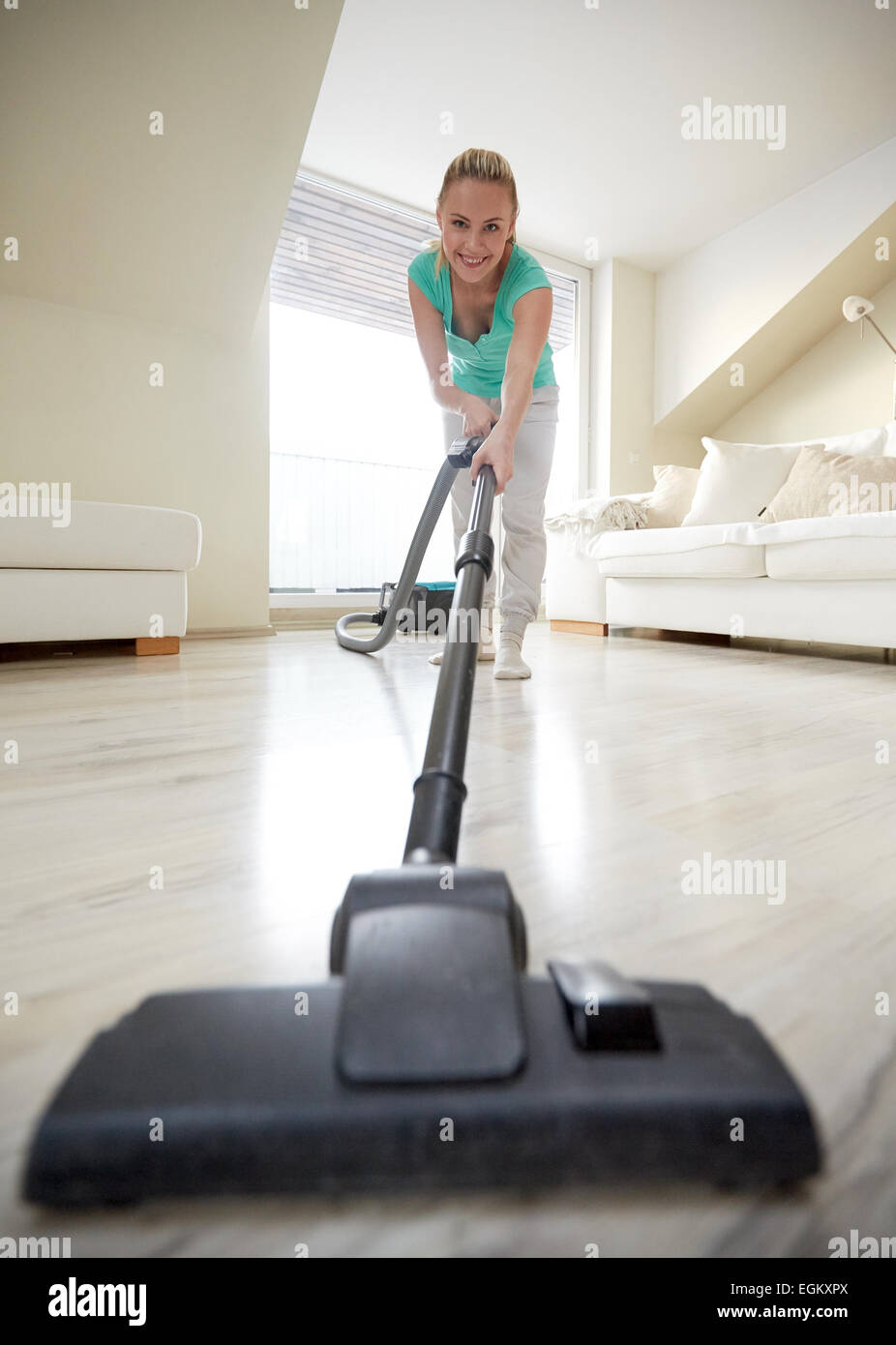 happy woman with vacuum cleaner at home Stock Photo - Alamy