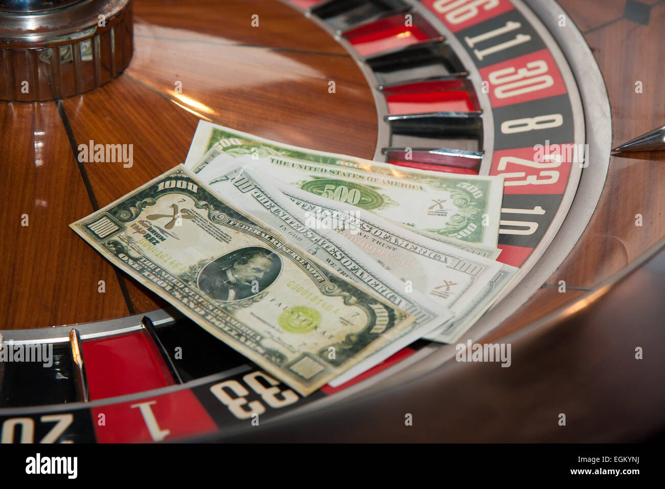 The pile of dollars notes on the roulette Stock Photo - Alamy