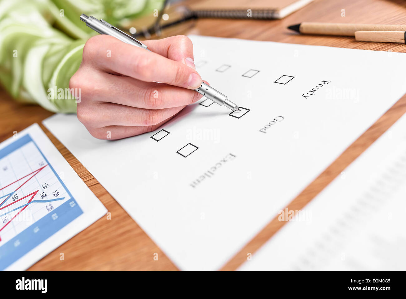 Examination paper on the office desk Stock Photo - Alamy