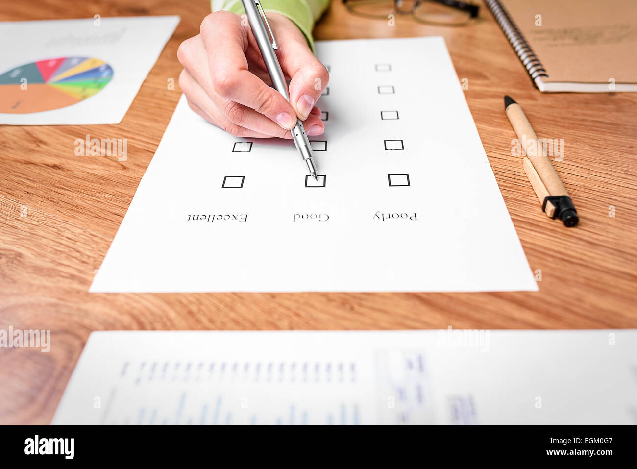 Examination paper on the office desk Stock Photo - Alamy