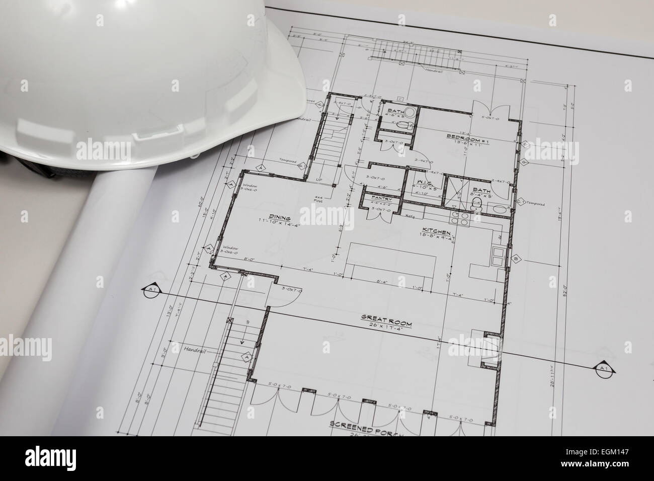 House plans and hard hat Stock Photo - Alamy