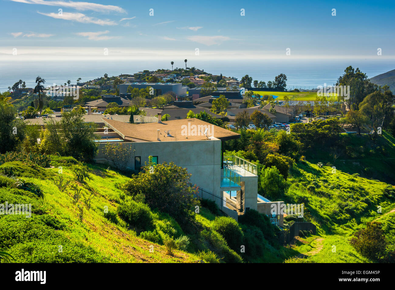 View of green hills and houses overlooking the Pacific Ocean, in Laguna ...