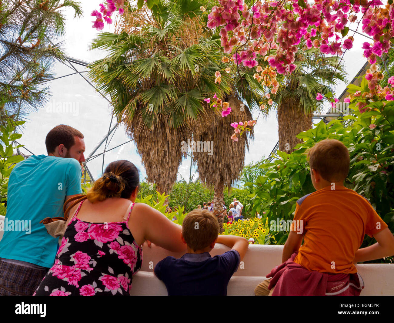 Family inside geodesic biome domes at the Eden Project near St Austell ...