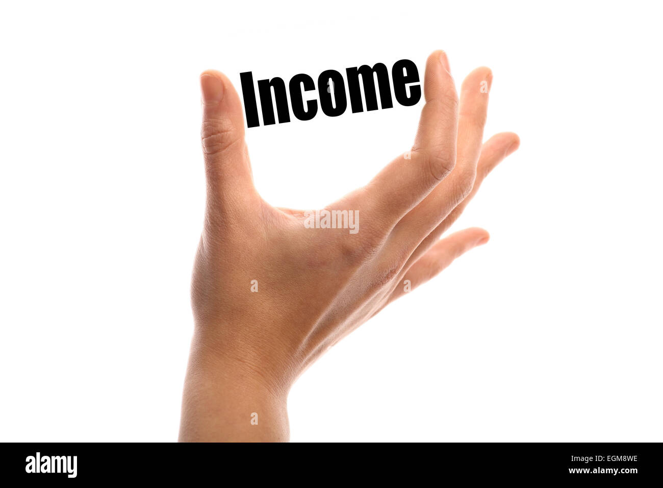 Horizontal shot of a hand holding the word "Income" between two fingers ...