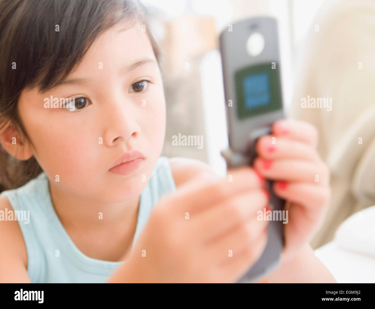 Child Dialing Cell Phone 2 Stock Photo - Alamy