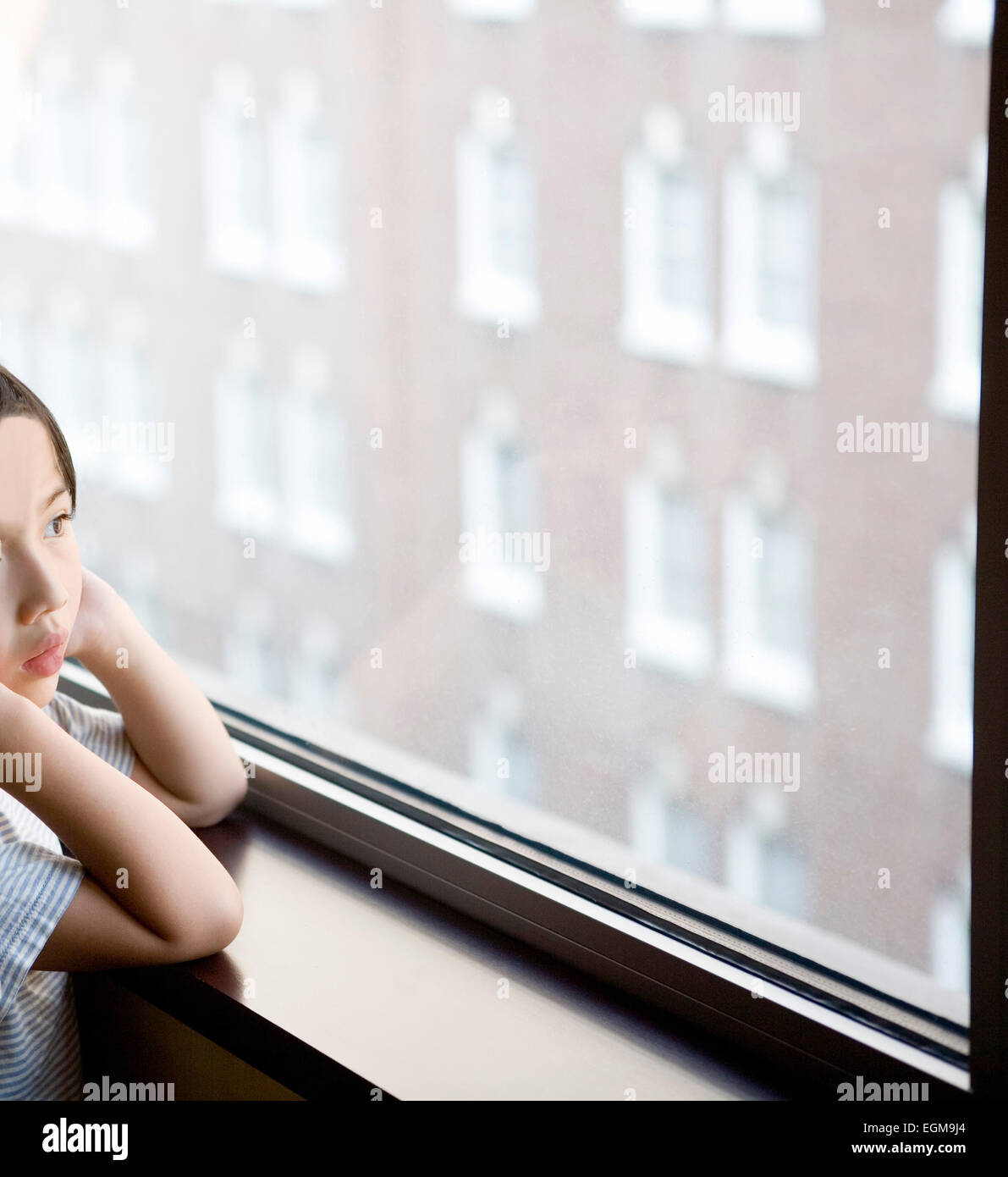 Girl Looking Out Window Stock Photo - Alamy