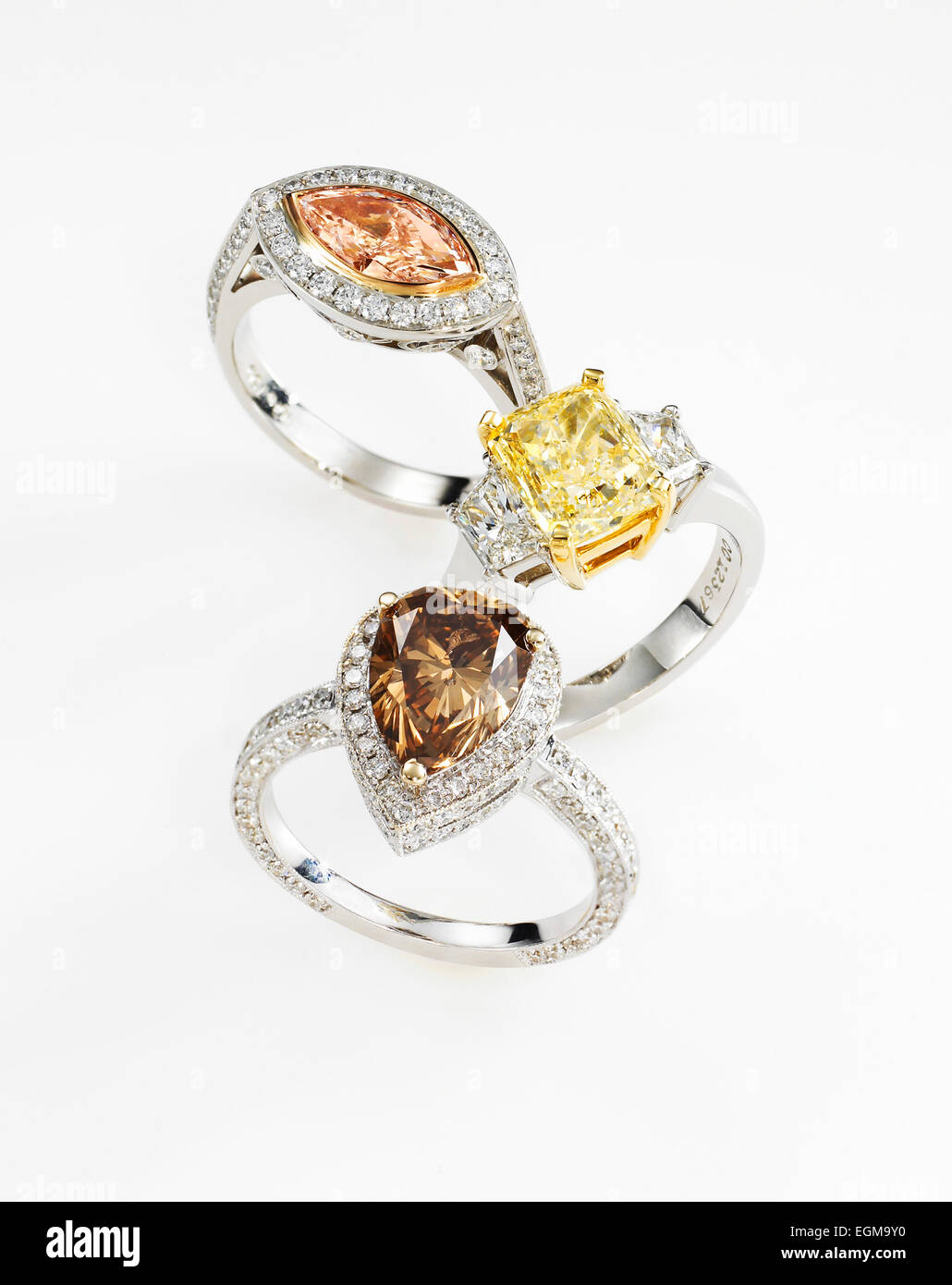 Three Engagement Rings Stock Photo - Alamy