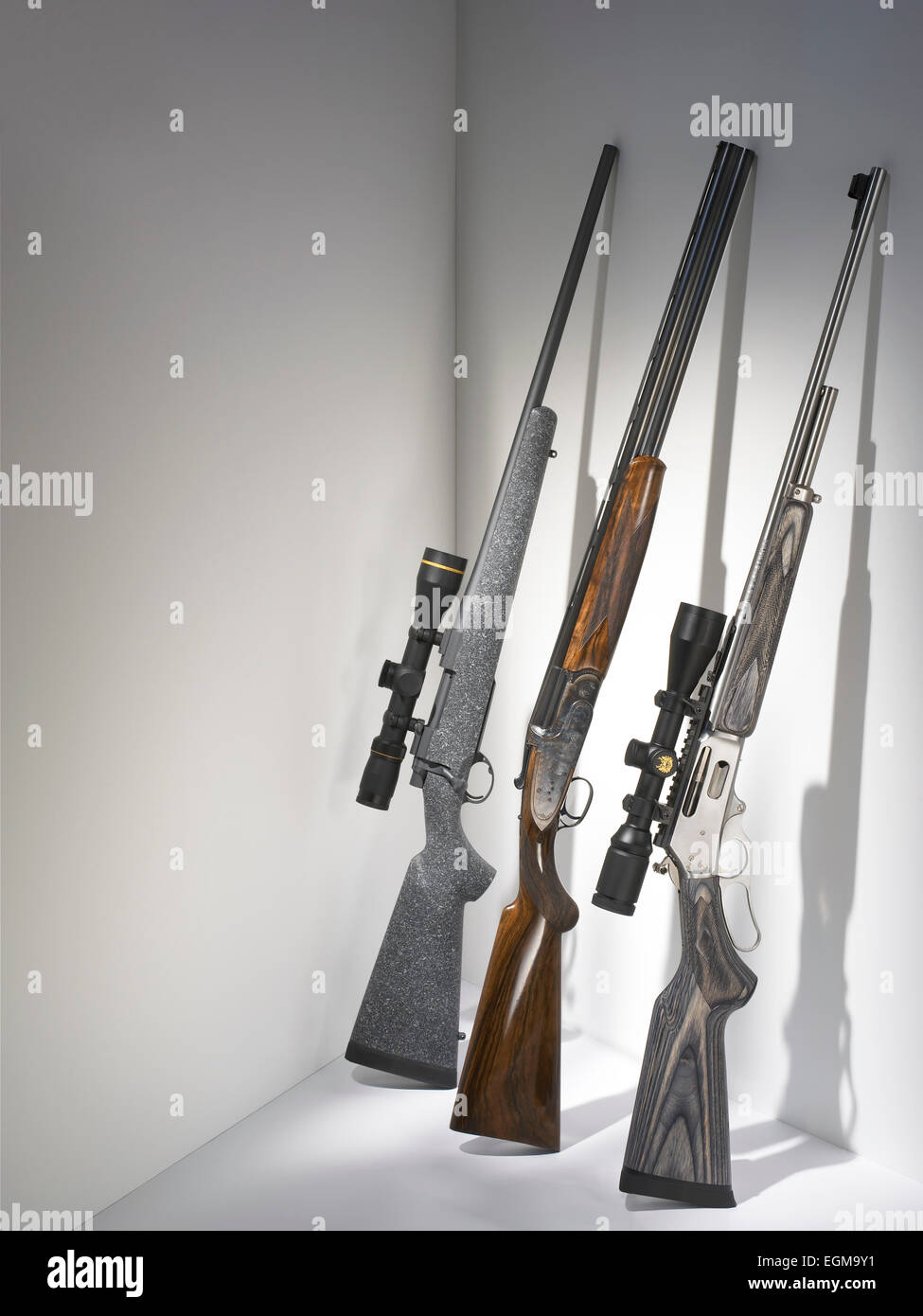 Three Hunging Rifles Stock Photo - Alamy
