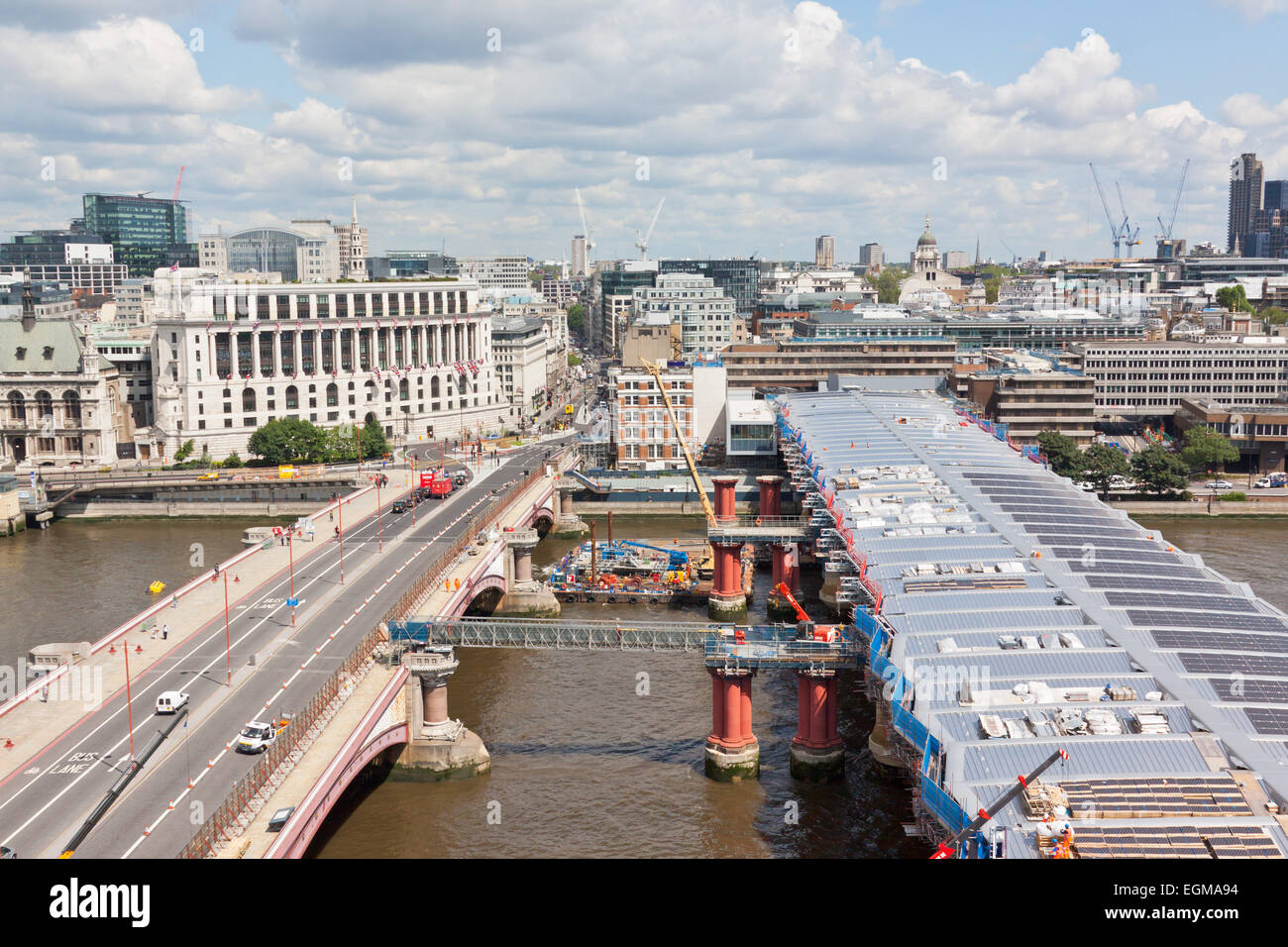 Construction work on the roof of Blackfriars Bridge, installing solar ...