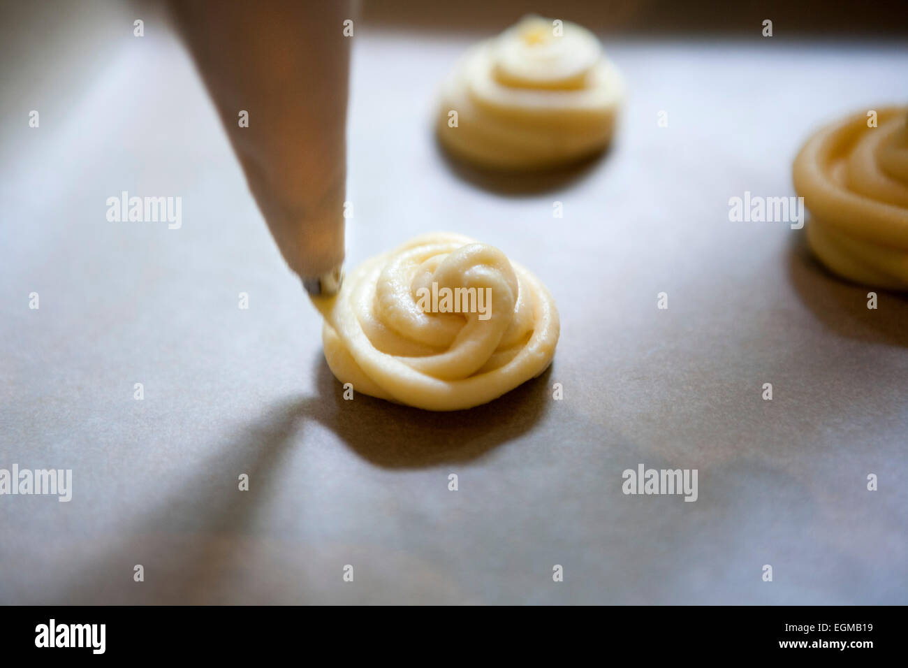 Squeezing dough hi-res stock photography and images - Alamy
