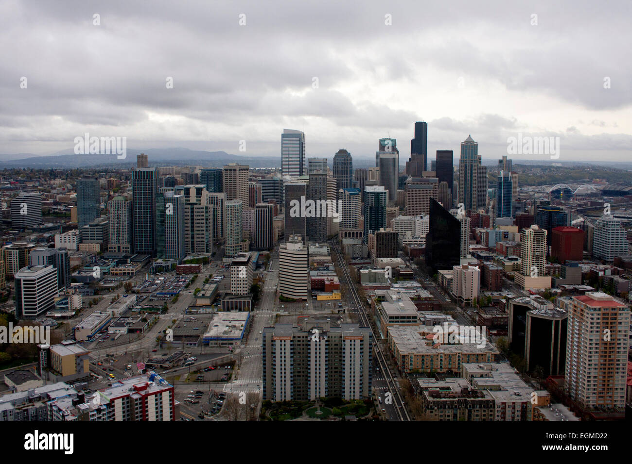 A view across Seattle city showing streets, buildings & skyscrapers and ...