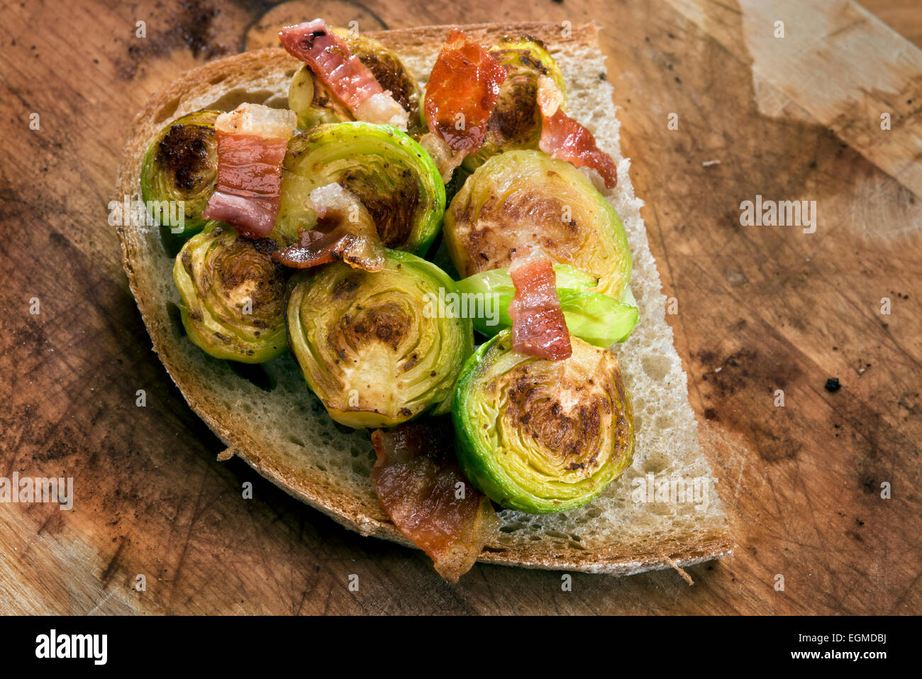 Grilled Brussels sprouts with bacon Stock Photo - Alamy