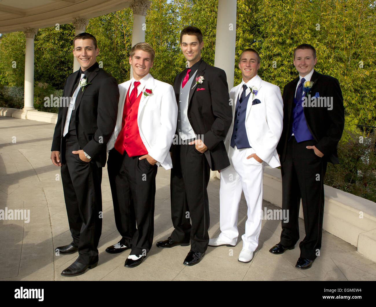Five Handsome Teenage Boys in Tuxedos Posing for a Prom Photo Outside ...