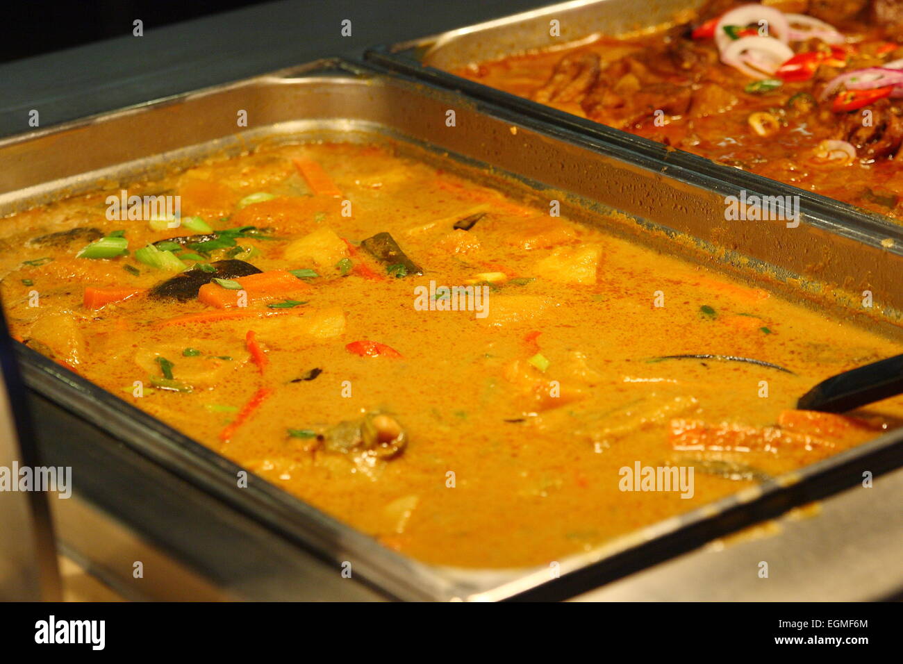 Vegetable curry on display at a restaurant Stock Photo - Alamy