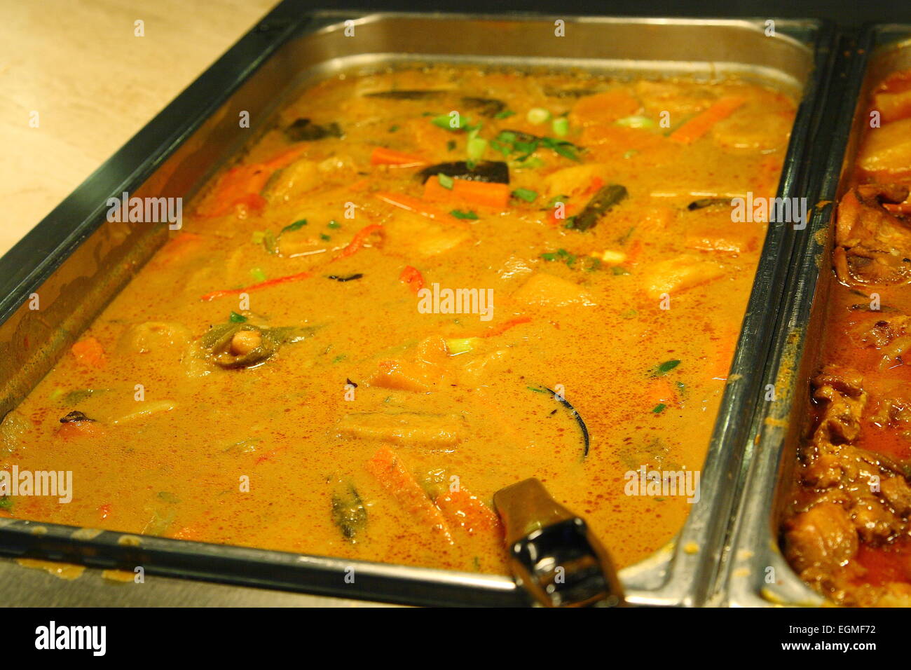 Vegetable curry on display at a restaurant Stock Photo - Alamy