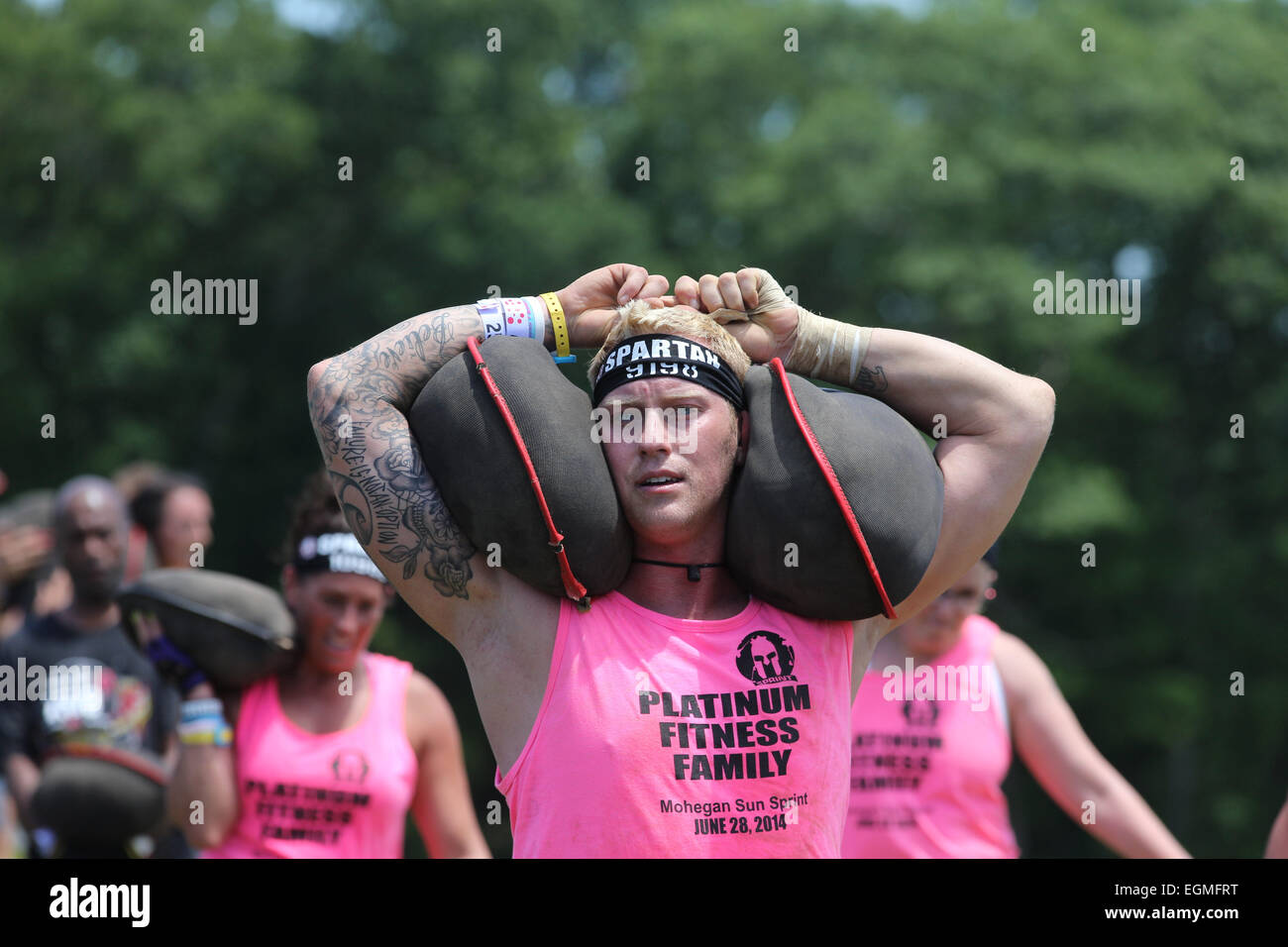 Competitors in action during the Reebok Spartan Race. Mohegan Sun ...